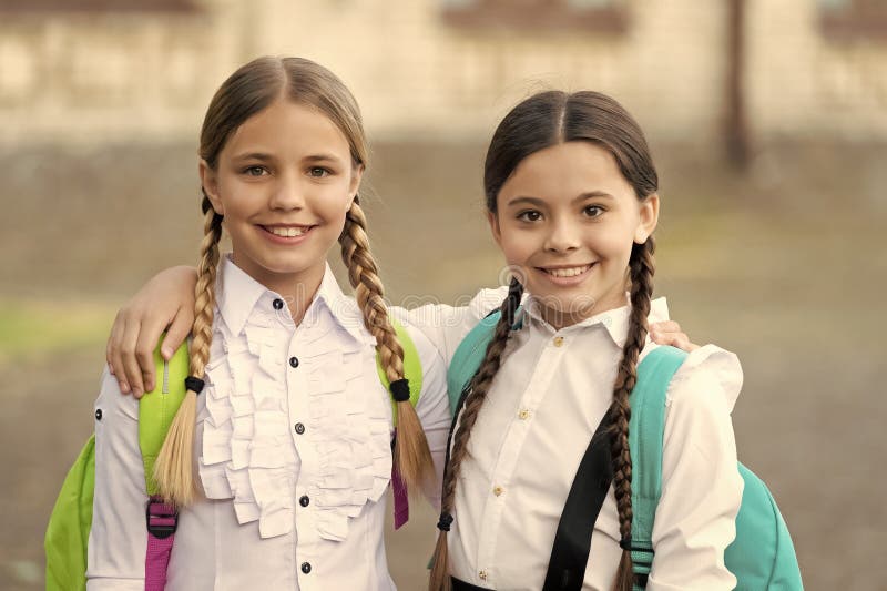 Happy Children Hug Together in School Uniform with Backpack Stock Image ...
