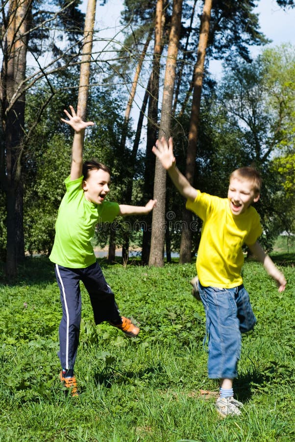 Happy children jumping stock image. Image of children - 14165359