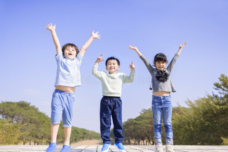 Happy Children Jumping and Dancing Stock Photo - Image of freedom ...