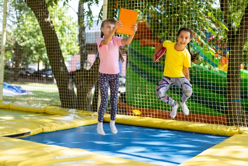Happy Children Jumping on Trampoline Stock Image - Image of smiling ...