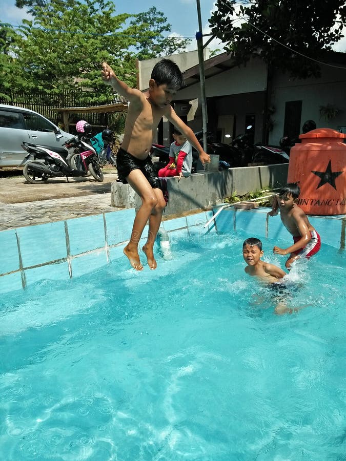 Three Children in Mini Pool at the Backyard Editorial Stock Image ...