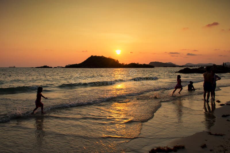 Happy Children Playing on the Beach at the Sunset Time Editorial Image ...