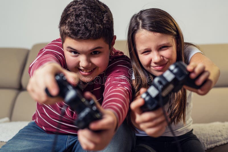 Happy Children Playing Computer Games at Home Stock Image - Image of ...