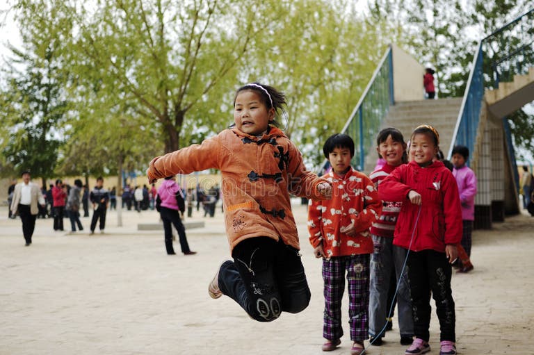 Happy Children Playing with Skipping Editorial Photo - Image of school ...