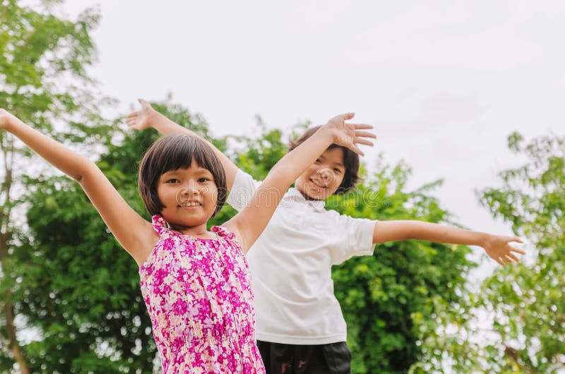 Happy Children Playing and Smile Stock Photo - Image of outdoors ...