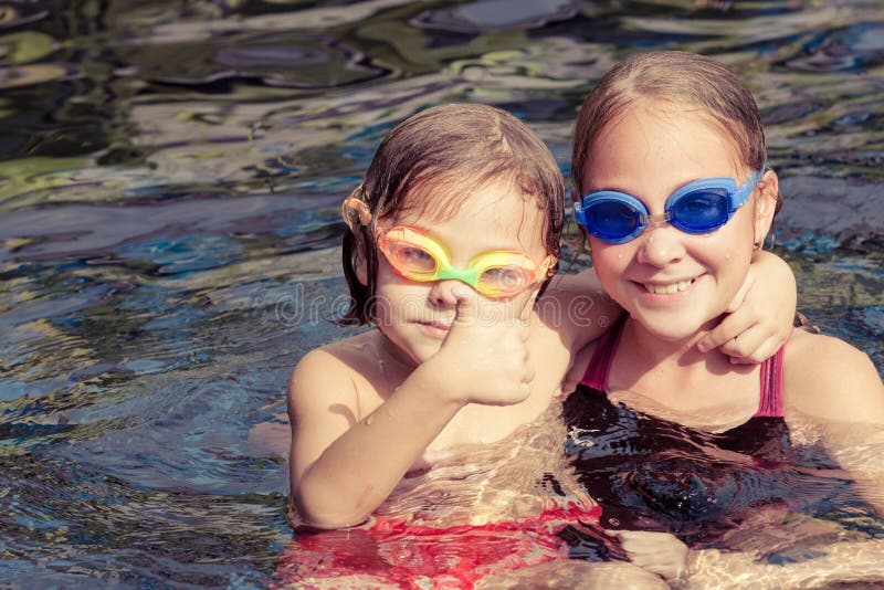 Happy Children Playing on the Swimming Pool Stock Photo - Image of ...