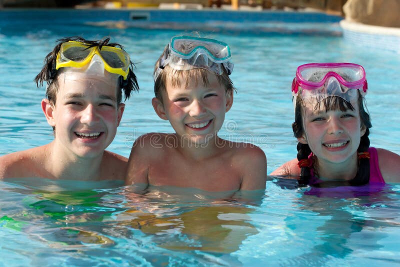 Happy children in pool stock photo. Image of blue, masks - 20340140