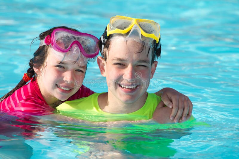 Happy children in pool stock photo. Image of lovable - 20341136