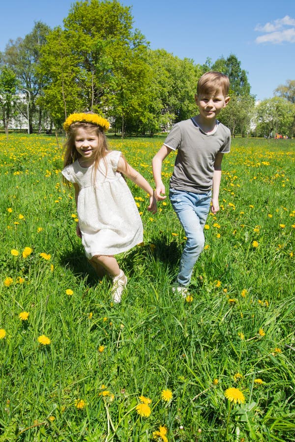 Happy Children Run on Meadow Stock Photo - Image of together, little ... Happy Children Run on Meadow Stock Photo - Image of together, little ...
