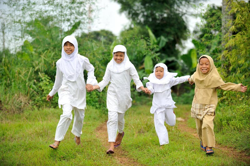 Happy Muslim Kids Outdoor stock photo. Image of portrait - 14633734