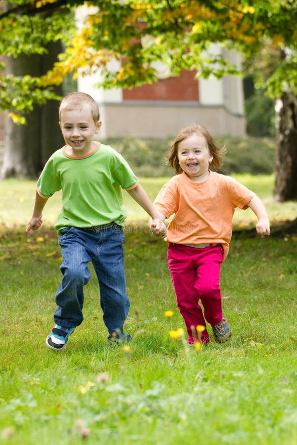 Happy children running stock photo. Image of friendship - 17772324