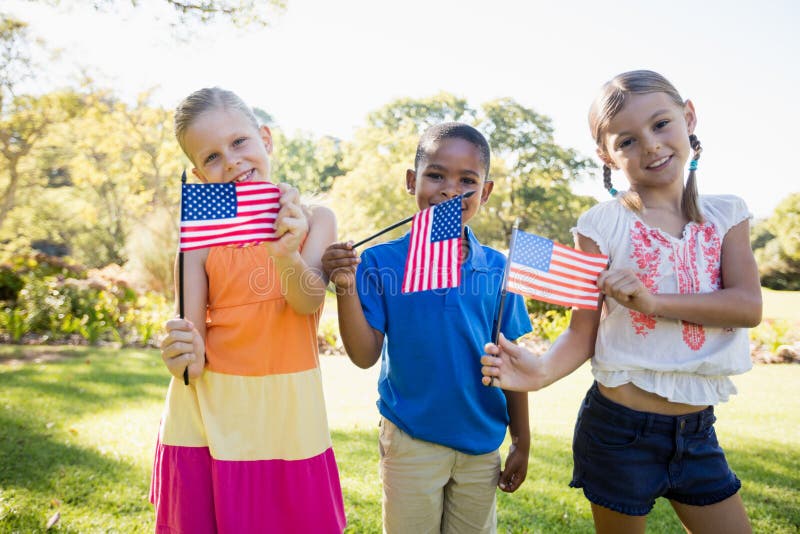 Happy Children Showing Usa Flag Stock Image - Image of leisure, grass ...