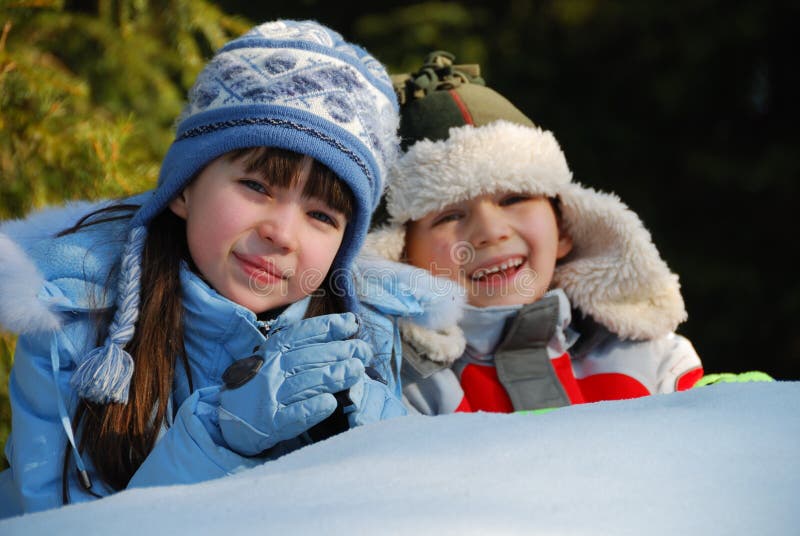 Happy children in snow stock photo. Image of season, pals - 5212338