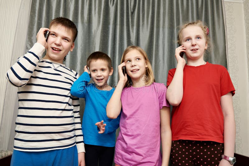 Happy Children Talking on Mobile Phones Stock Image - Image of girl ...