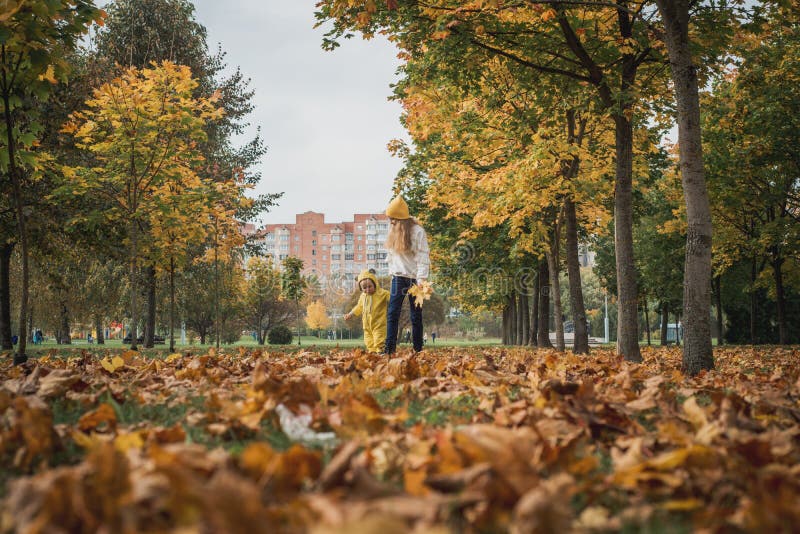 Happy Children Walk in Autumn Park. Leaf Fall, Lifestyle Stock Photo ...