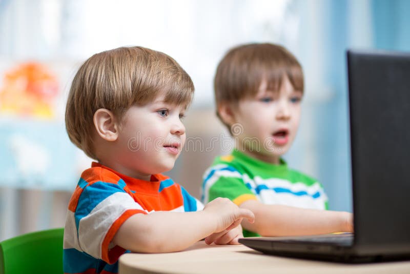 Happy Children Working at Laptop Stock Photo - Image of nursery, kids ...