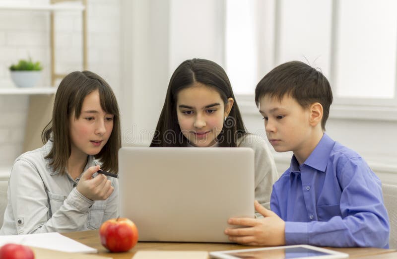 Happy Children Working on Project, Using Laptop Stock Photo - Image of ...