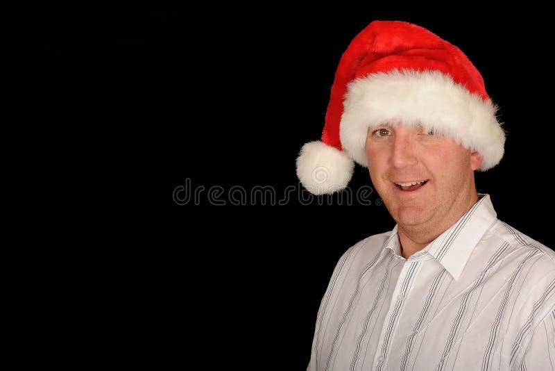 Man wearing Santa hat stock image. Image of smiling, male - 21878559