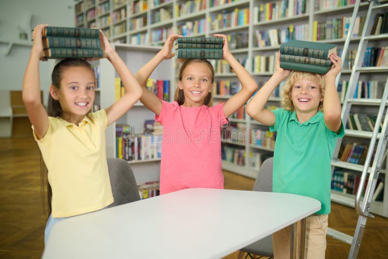 Happy Classmates Spending Time in the School Library Stock Image ...