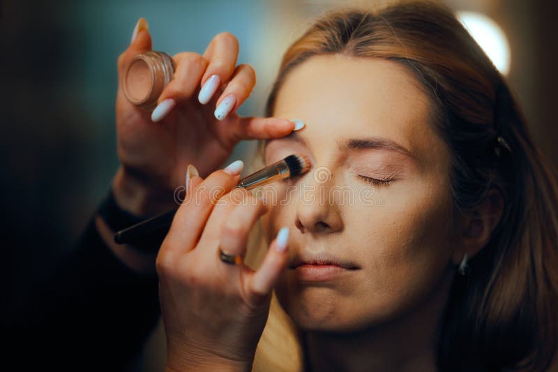 Professional Using Eye Base Primer before Applying Eye Shadow Stock ...