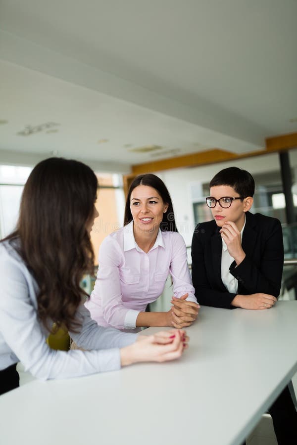 Happy Colleagues Casual Chat at the Office Stock Photo - Image of group ...