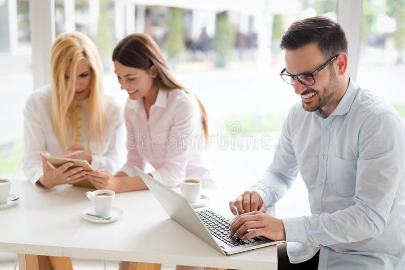 Happy Colleagues Casual Chat at the Office Stock Photo - Image of ...