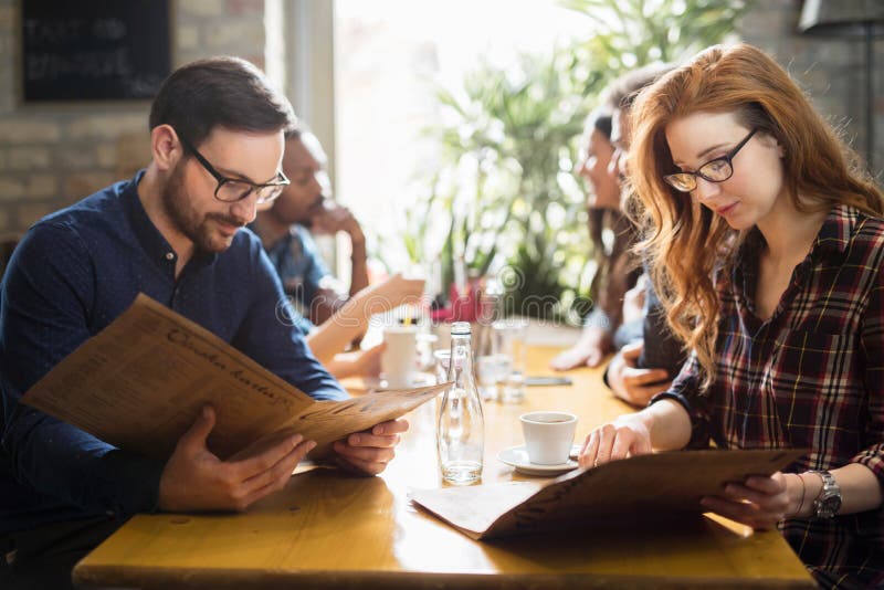 Happy Colleagues from Work Socializing in Restaurant Stock Image ...