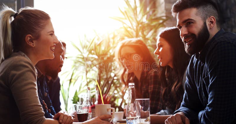 Happy Colleagues from Work Socializing in Restaurant Stock Photo ...