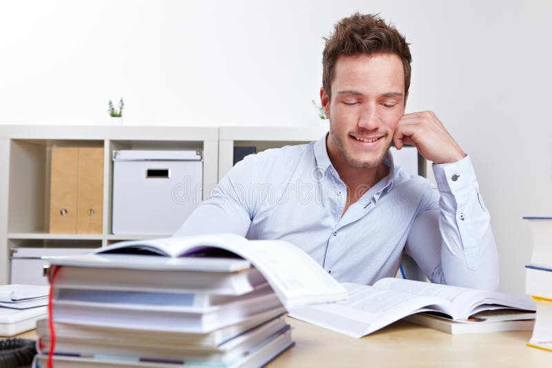 Happy College Student Learning Stock Photo - Image of place, book: 23509692