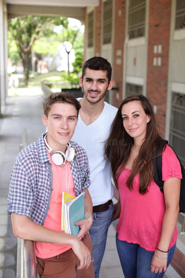 Happy College Students Using Computer Stock Photo - Image of outdoor ...