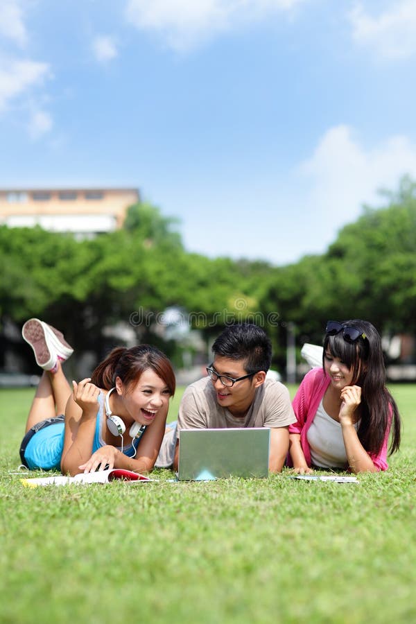 Happy College Students Using Computer Stock Image - Image of notebook ...