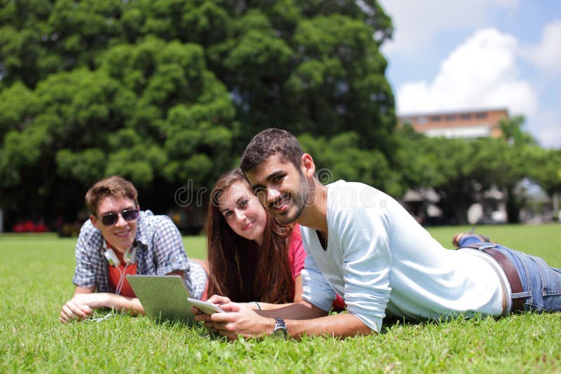 Happy College Students Using Computer Stock Photo - Image of school ...