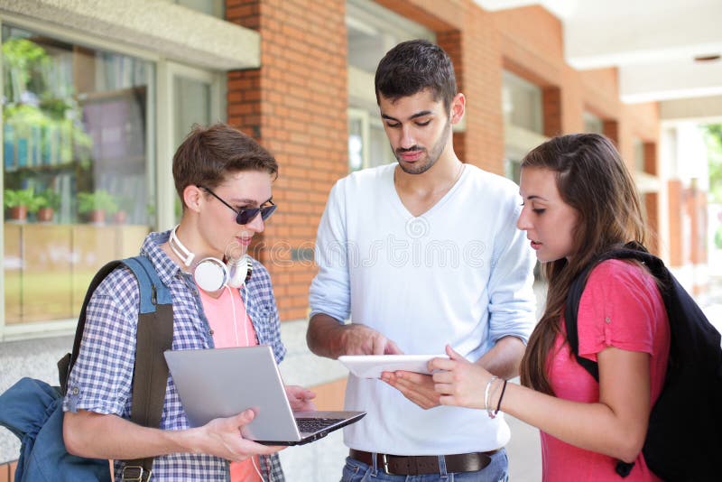 Happy College Students Using Computer Stock Image - Image of casual ...