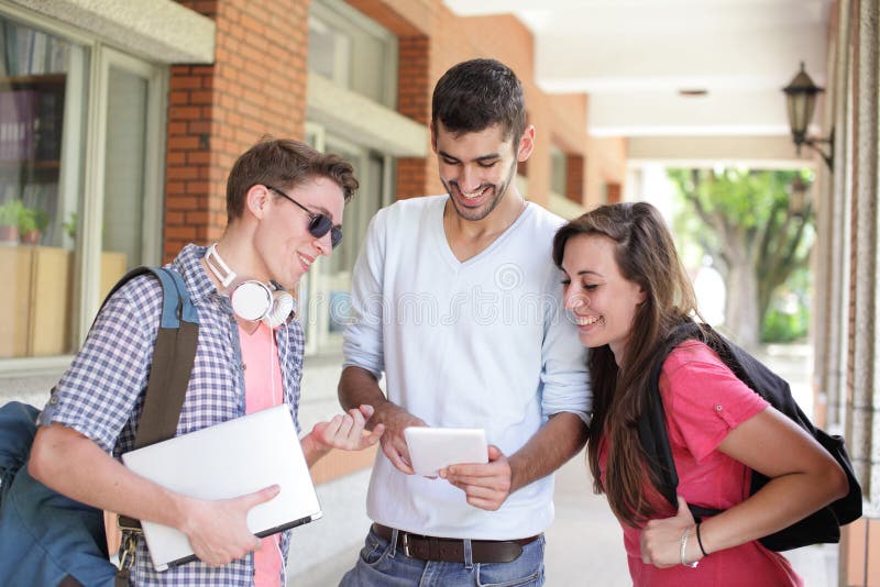 Happy College Students Using Computer Stock Image - Image of friendship ...