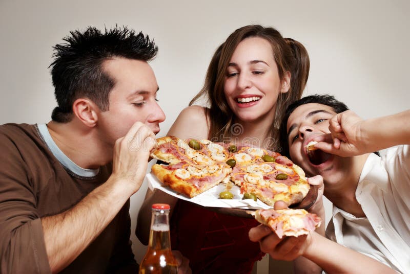 Happy Company of Youth Eating a Pizza Stock Image - Image of ...