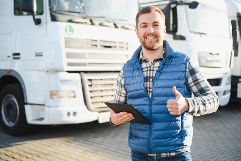 Happy Confident Male Driver Standing in Front on His Truck, Using His ...