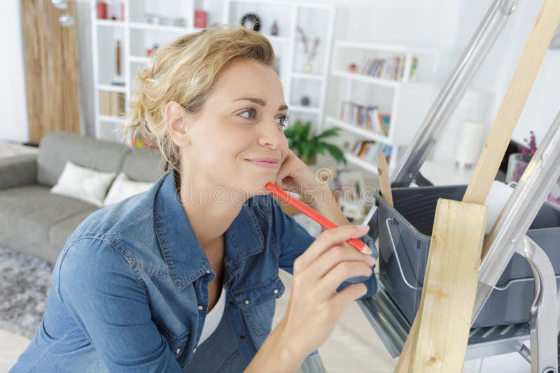 Happy Contemplative Woman Interior Designer Stock Photos - Free ...