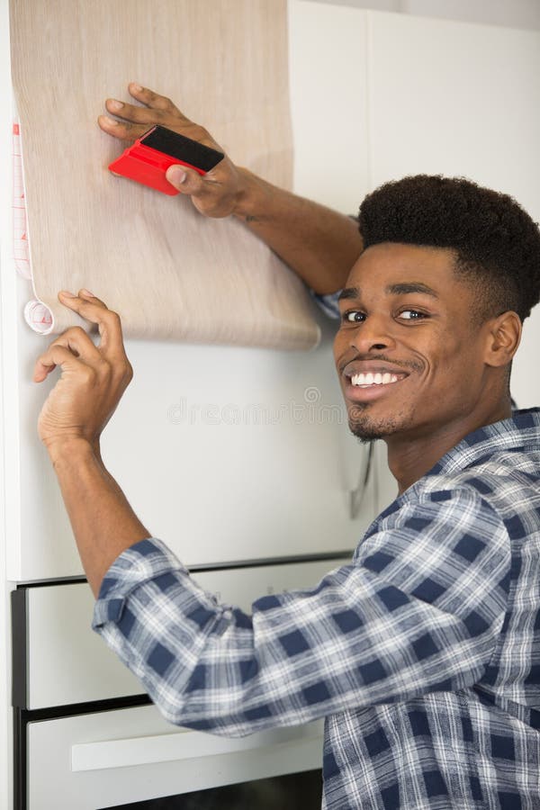 Happy Contractor Worker Preparing for Wallpaper Decoration Stock Photo ...