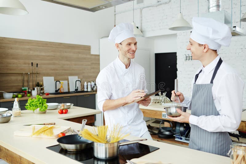 Happy Cook Talking To Intern at Cooking Class Stock Photo - Image of ...