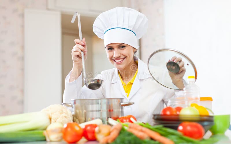 Happy Cook Works with Ladle Stock Photo - Image of sauce, eats: 63795606