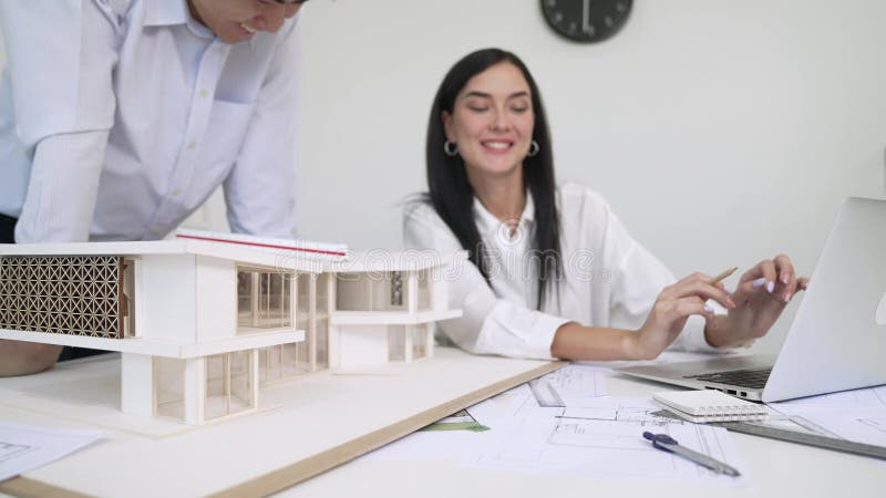 Happy Cooperate Architect Team Working Together by Using Laptop ...