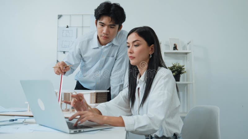 Happy Cooperate Architect Team Working Together by Using Laptop ...