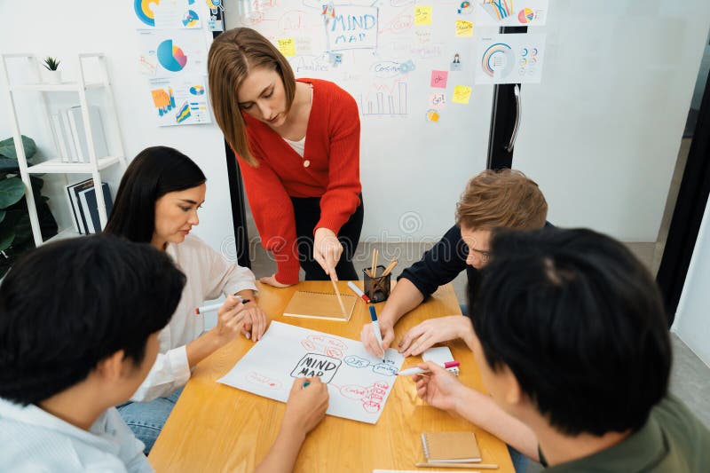 Multi-ethnic Business Group Brainstorming about Marketing Plan ...