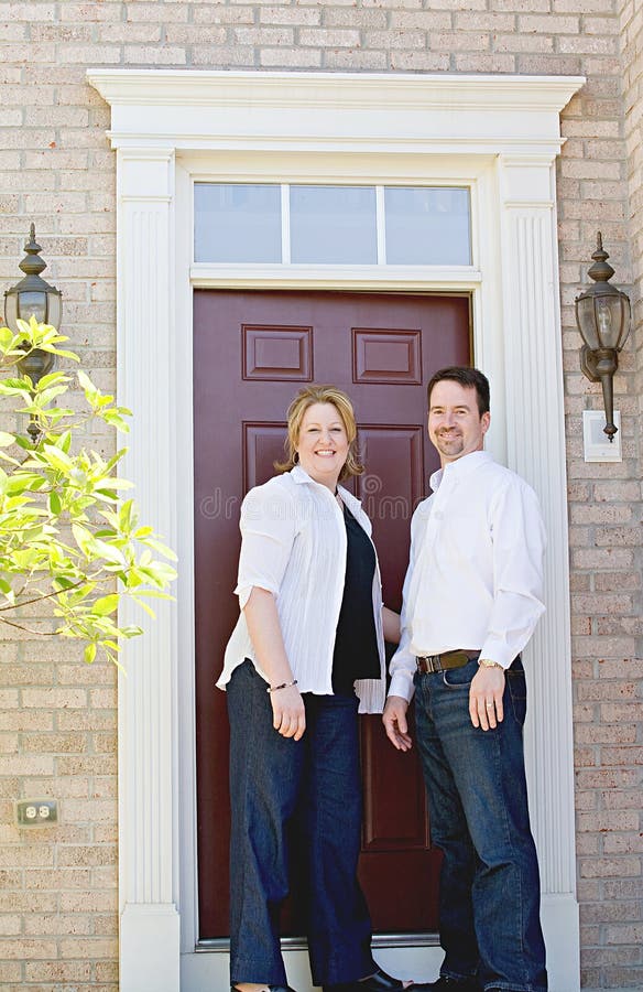 Happy Couple stock image. Image of homes, door, couple - 5414215