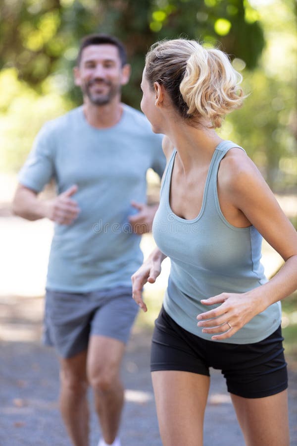 Happy Couple Athletes Running in Park Stock Image - Image of outdoors ...
