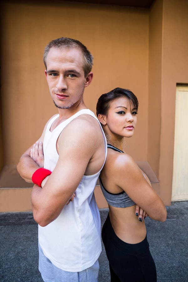 Happy couple back to back stock image. Image of female - 56809343