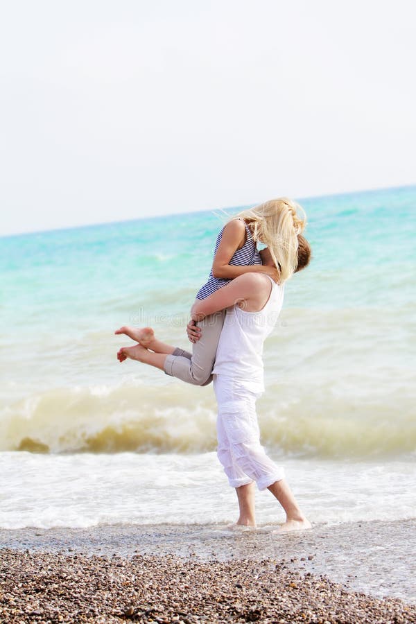 Happy couple on beach stock image. Image of nature, healthy - 24927735