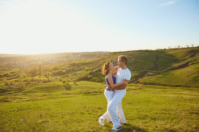 Happy Couple on a Beautiful Sunset in Nature Stock Photo - Image of ...