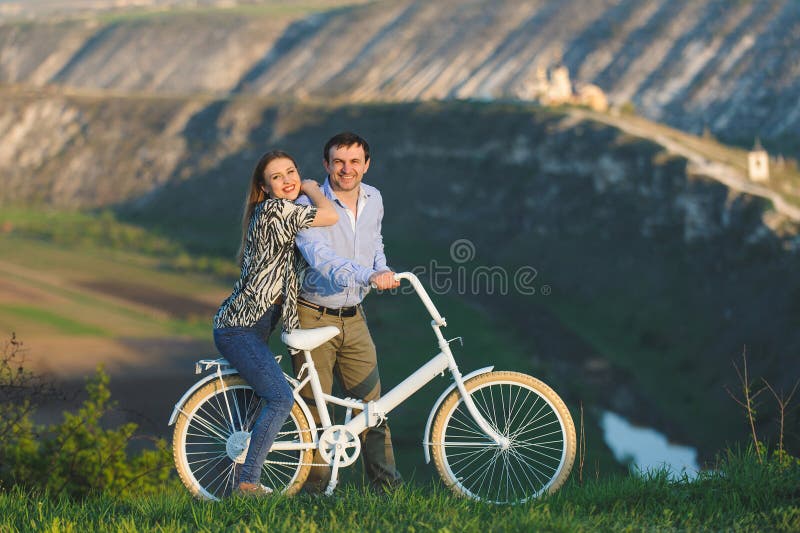 Happy Couple with Bicycle stock photo. Image of nature - 57169026