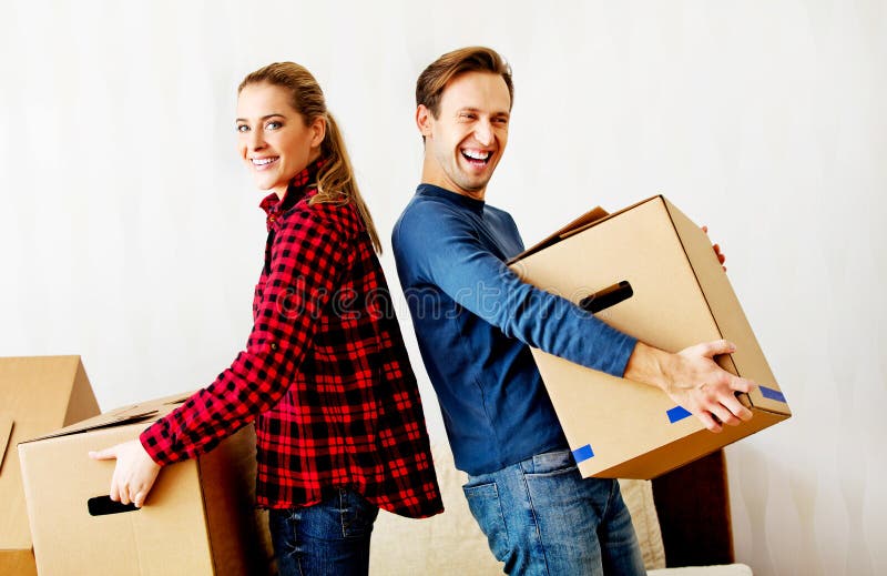 Happy Couple Carrying Cardboard Boxes in New Home Stock Image - Image ...